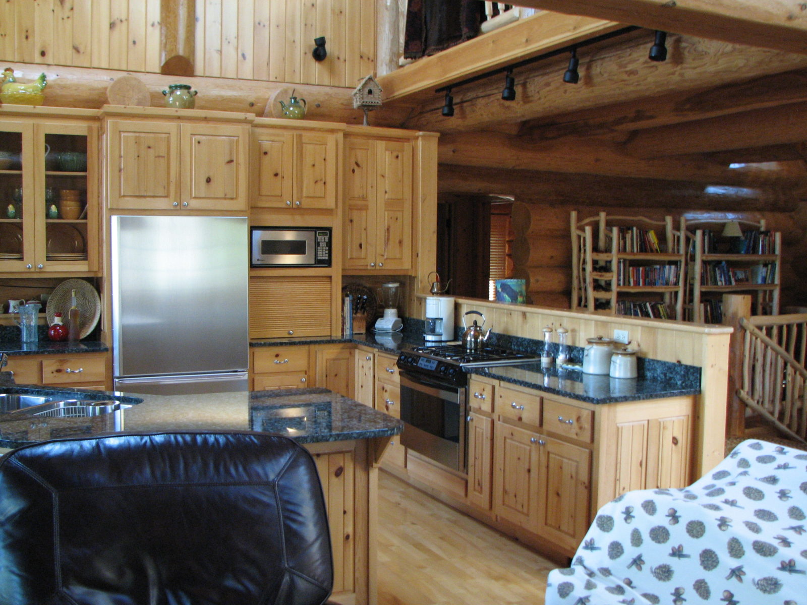 Large Log Home, Stone and Cedar Logs - Huisman Concepts